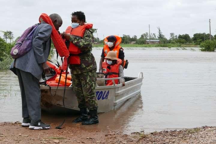Boats placed on Maputo rivers in case rising water levels flood roads ...