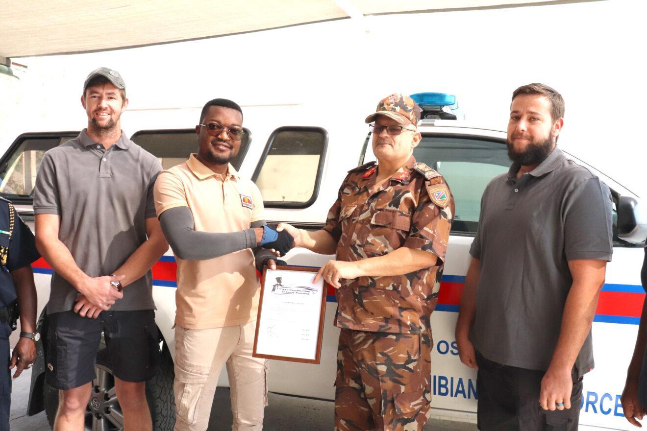 Panelbeaters repair police vehicle - Namibia