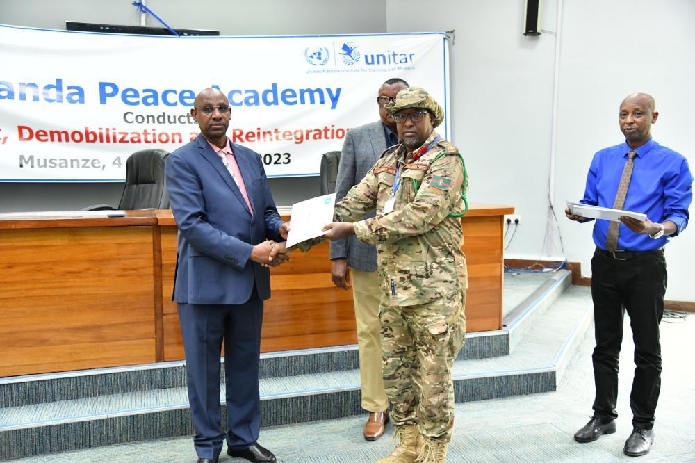 PHOTOS: Military, Police and Civilian Officers Complete Disarmament ...