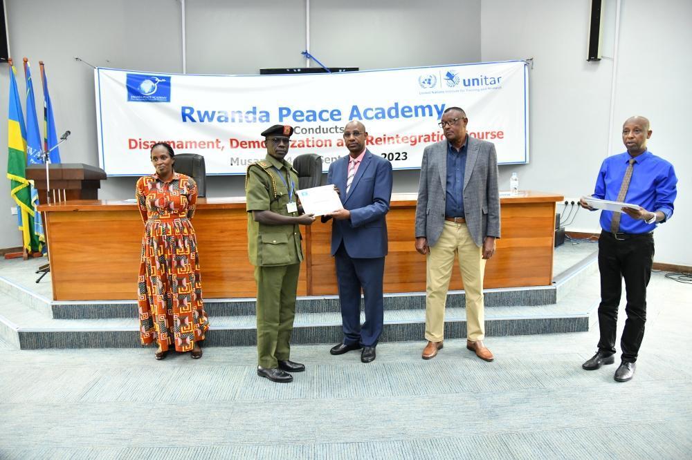 PHOTOS: Military, Police and Civilian Officers Complete Disarmament ...