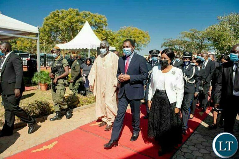 President Hichilema console mourners at the funeral house of late ...